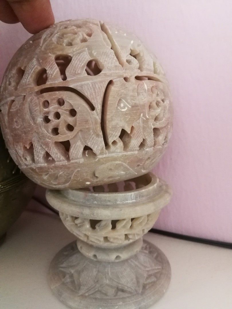 Hand carved stone globe (candle holder / trinket holder), carved using monolithic rock-cut ...