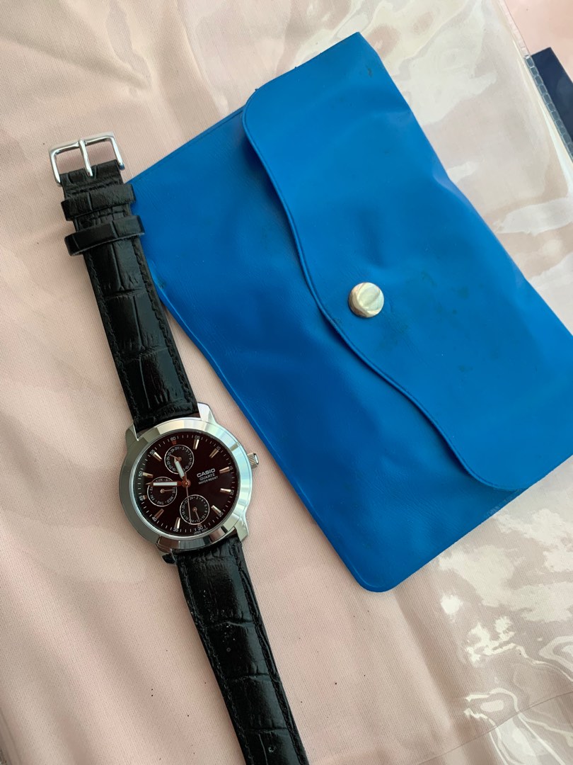 Casio watch with pouch, Luxury, Watches on Carousell