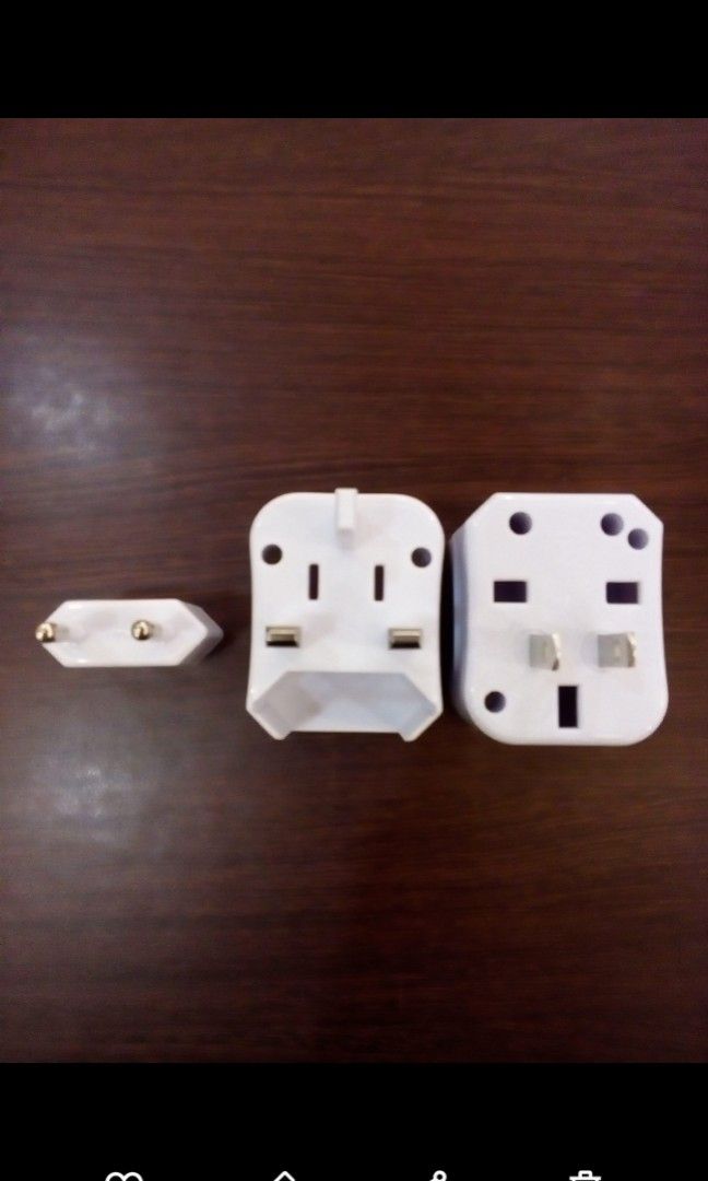 Free Brand New Compact Universal Travel Adapter, TV & Home Appliances ...