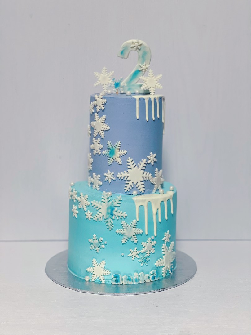 Frozen theme 2 tier cake, Food & Drinks, Homemade Bakes on Carousell