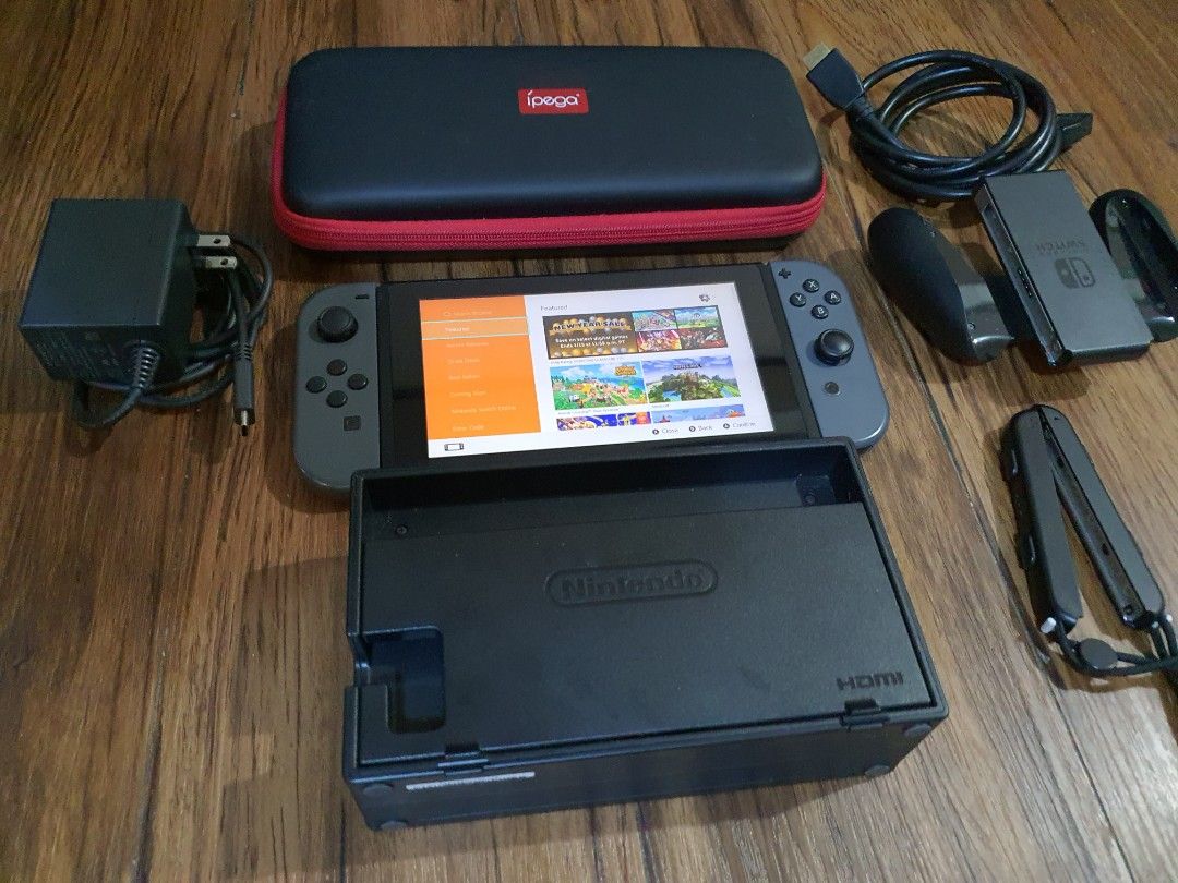 Nintendo switch V2 complete set 64GB lots of games, Video Gaming, Video ...