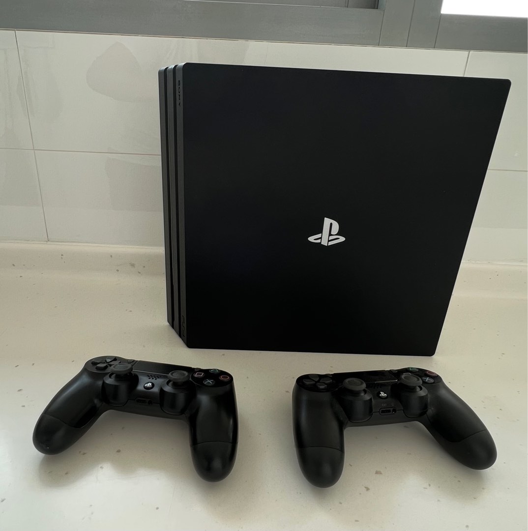 PS4 Pro (1TB) Console + 2 wireless controllers, Video Gaming, Video ...