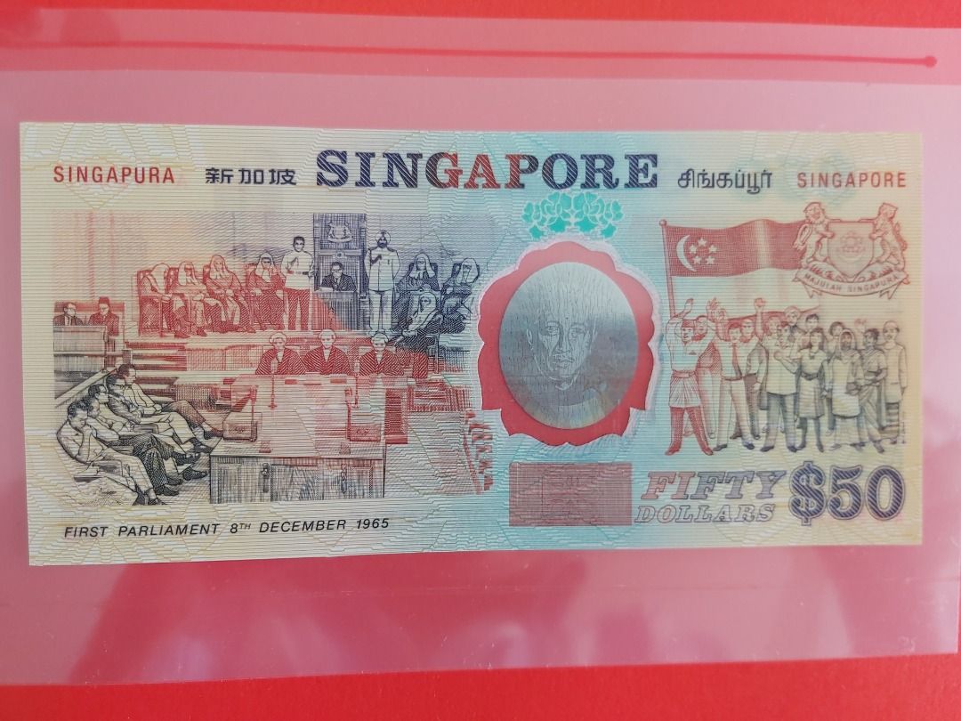 Singapore 25th Anniversary SGD 50 Commemorative note. Comes with a ...