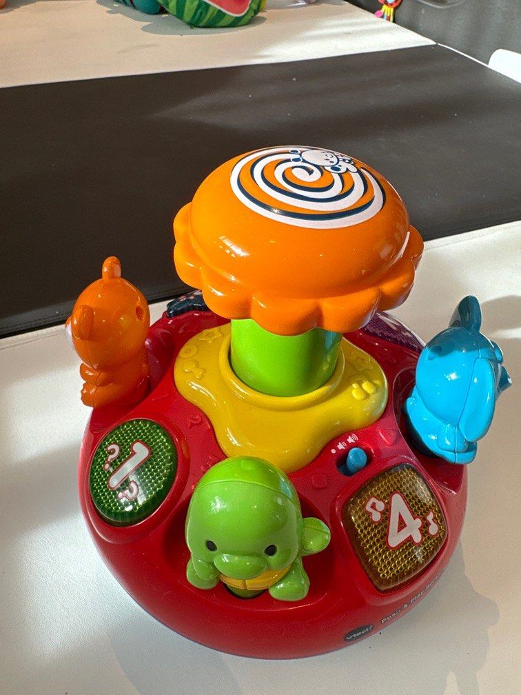 Vtech push & play spinning top, Babies & Kids, Infant Playtime on Carousell