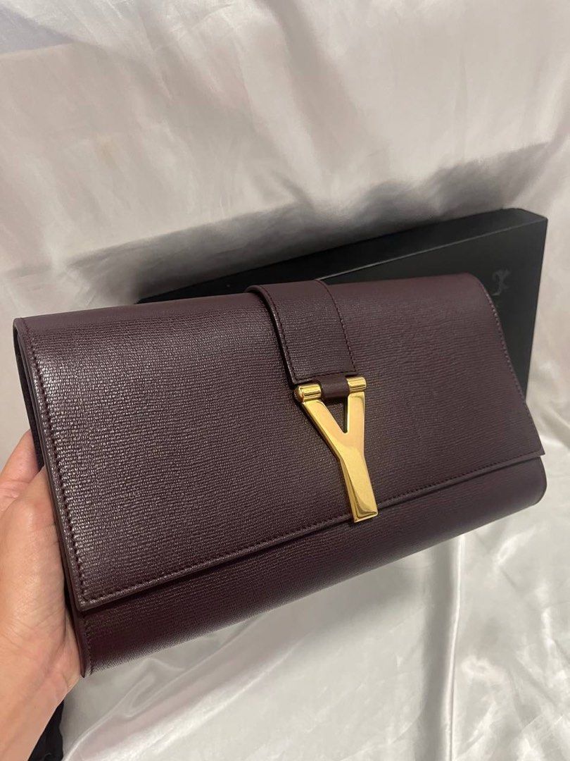 Ysl saint Laurent clutch bag, Luxury, Bags & Wallets on Carousell