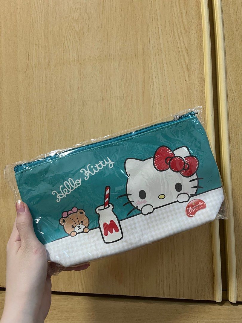 Magnolia hello kitty pouch, Women's Fashion, Bags & Wallets, Purses & Pouches on Carousell
