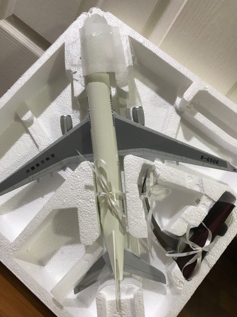 MU China Eastern aircraft, Hobbies & Toys, Travel, Travel Essentials ...
