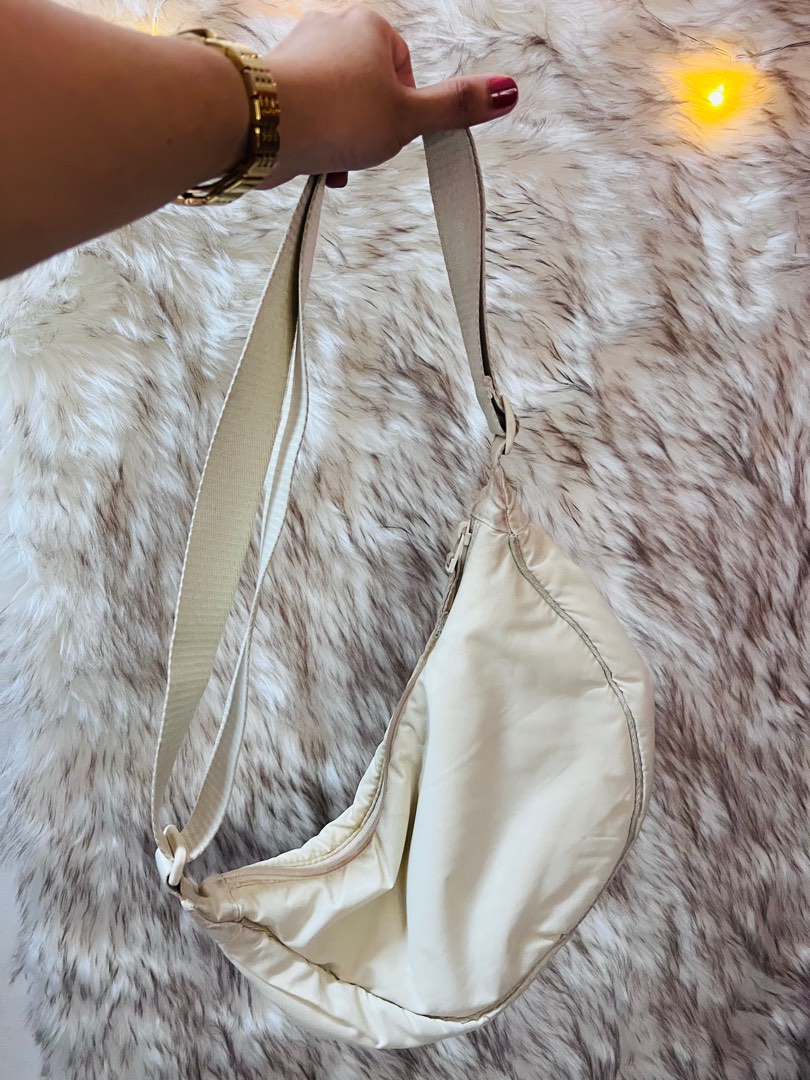 Uniqlo Round Mini Bag (Natural), Women's Fashion, Bags & Wallets, Cross-body Bags on Carousell