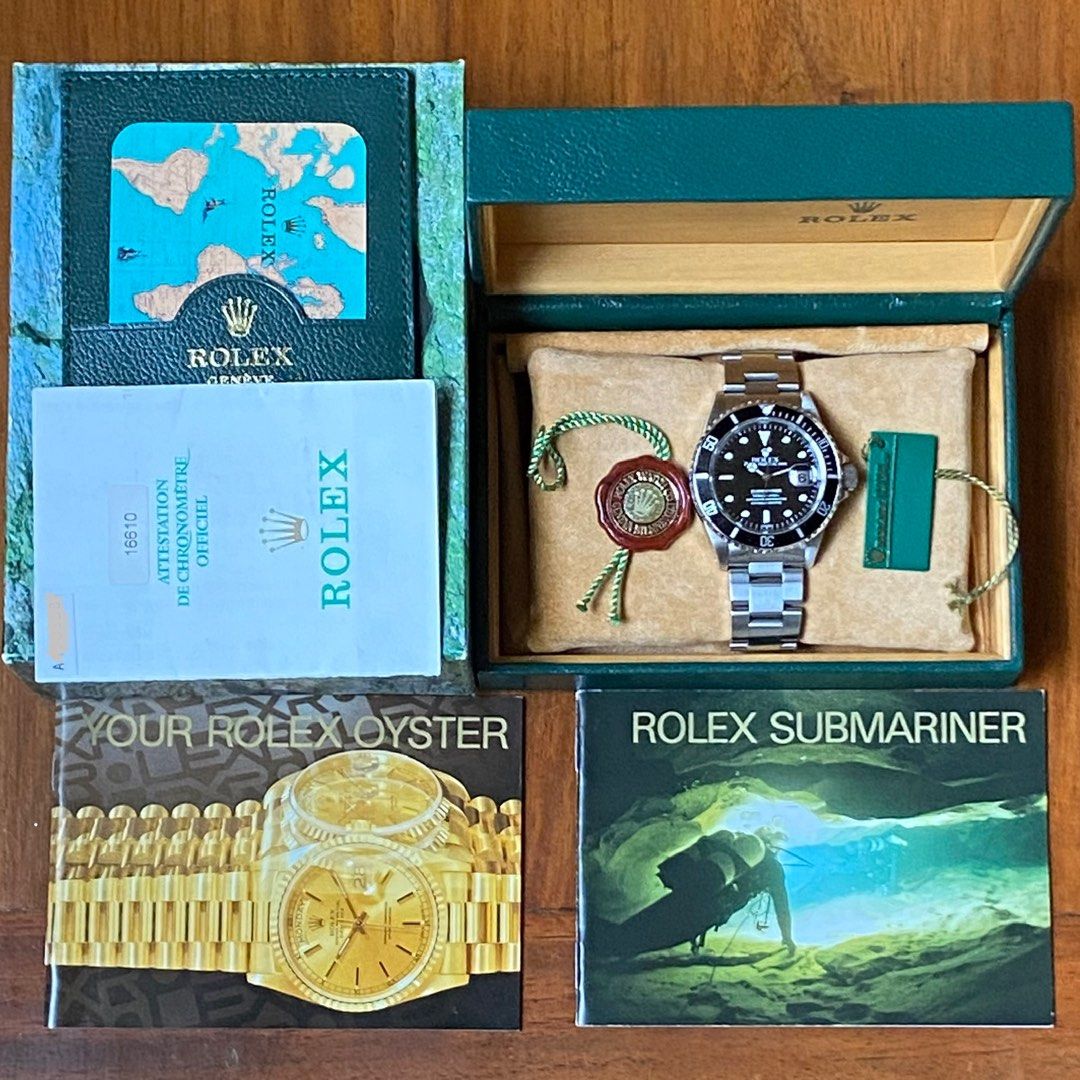 Submariner date 16610 pre ceramic 40mm swiss only dial inmaculate ...