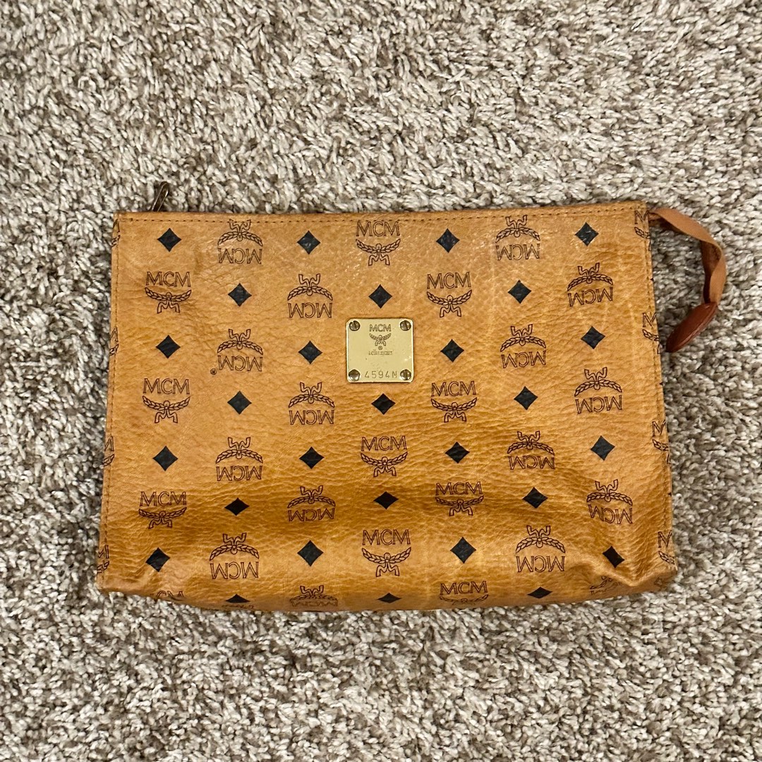 MCM Pouch, Luxury, Bags & Wallets on Carousell