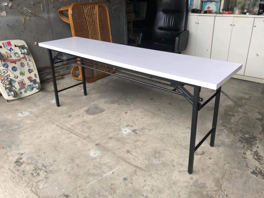 Minimalist long folding table 71L x 18W x 28H inches In good condition ...