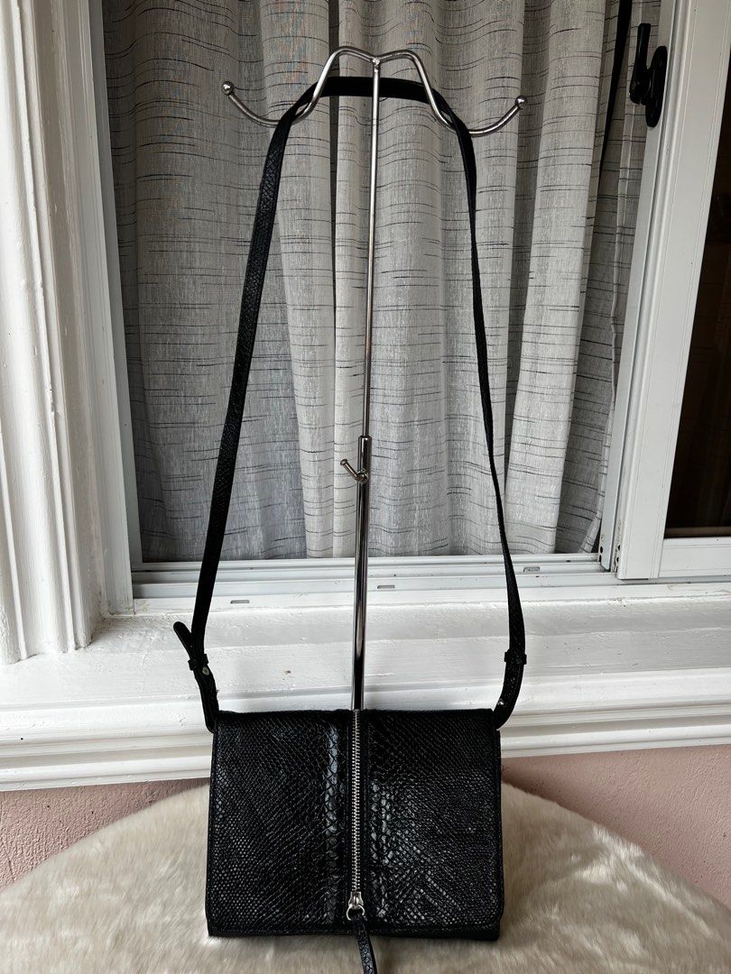 Patrice Breal Leather Sling Bag in Black, Women's Fashion, Bags ...
