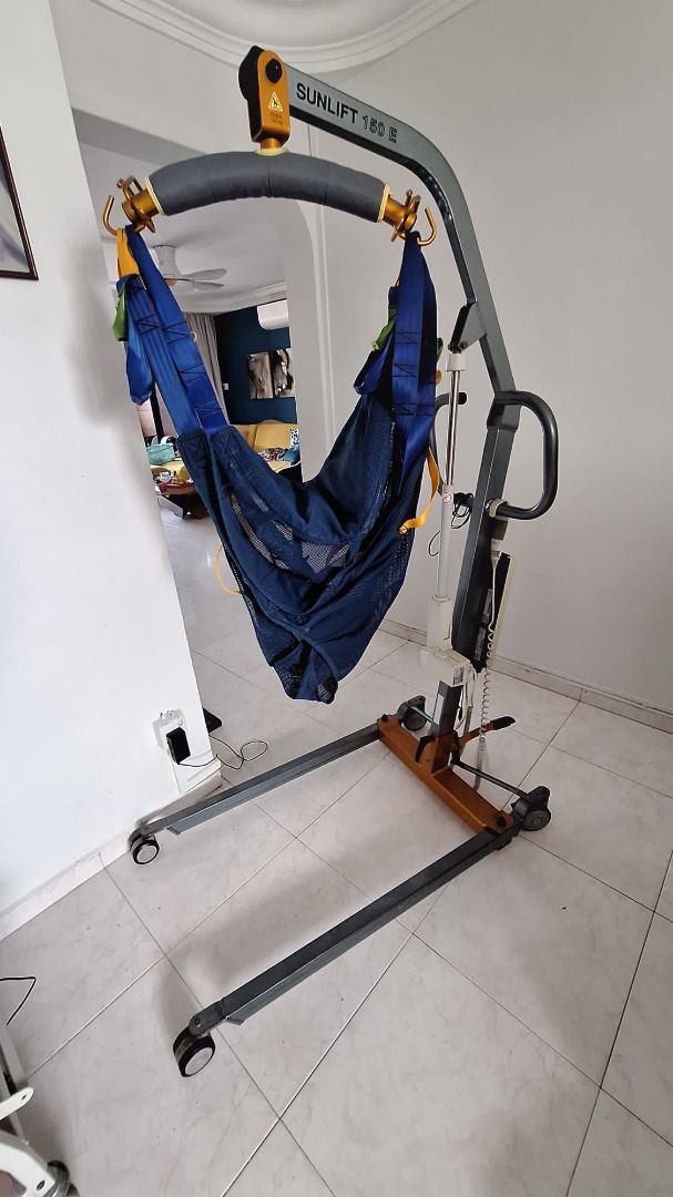 Hoist for transferring patient from bed to wheelchair and vice versa ...