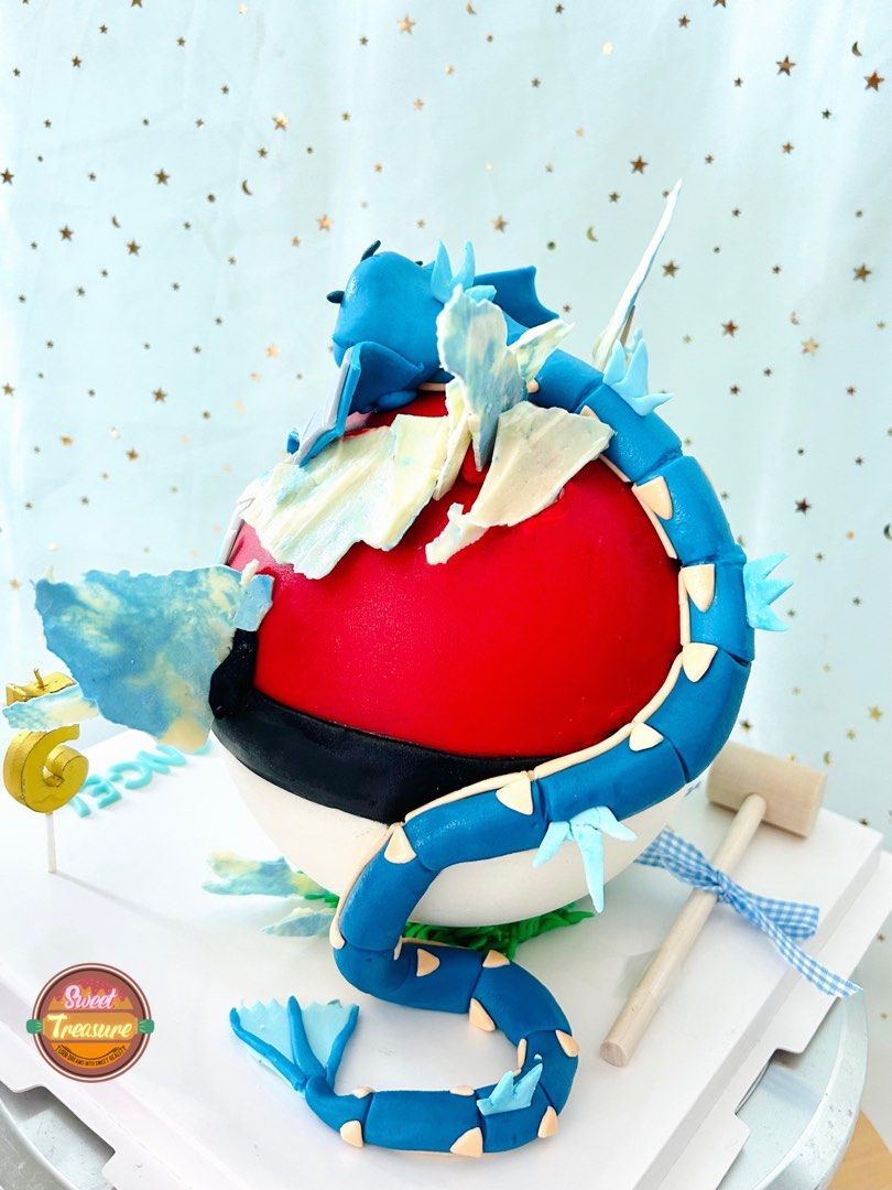 Pokemon Gyarados / Charizard ultra ball Pinata knock knock cake, Food ...
