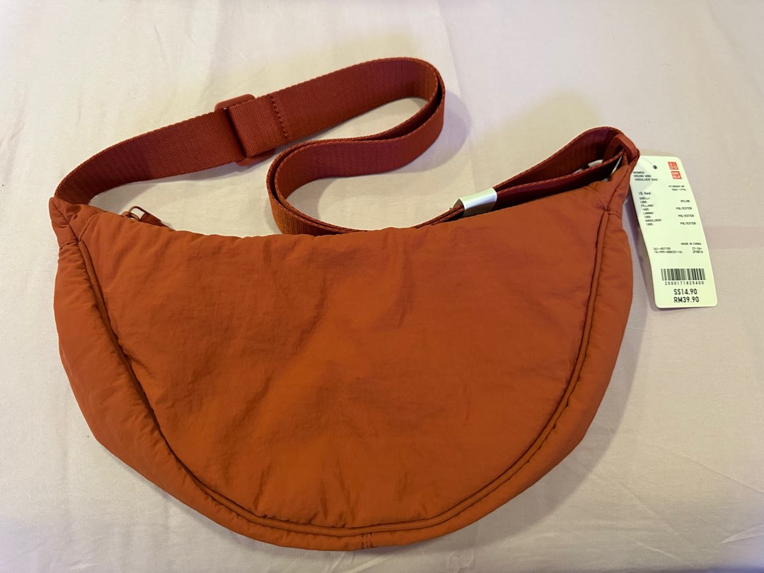 Brand new-Uniqlo dumpling bag, Women's Fashion, Bags & Wallets ...