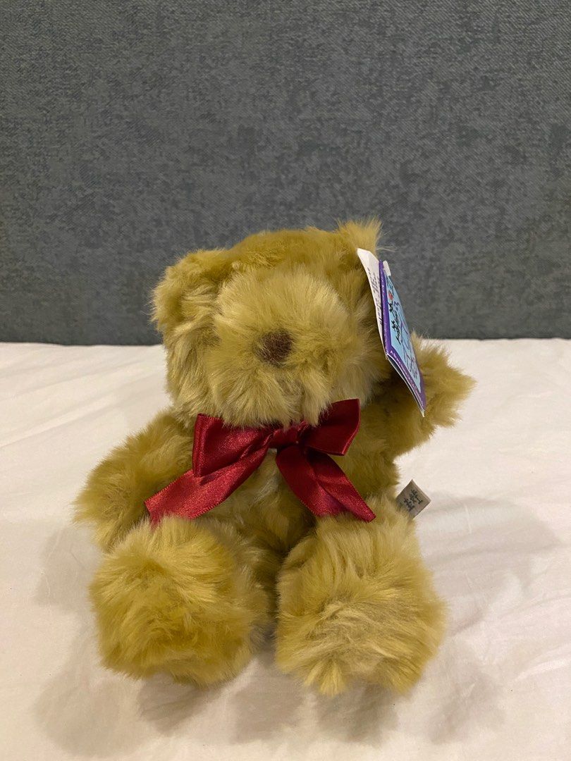 Golden brown furry bear with red ribbon plush toy, Hobbies & Toys, Toys ...