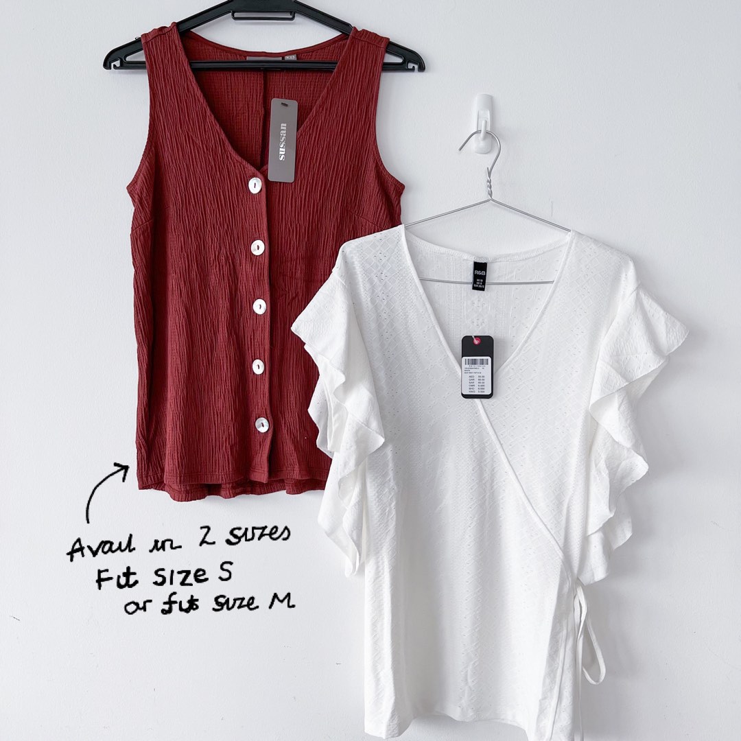 Sussans dark red top with mother of Pearl like big buttons. Sizing runs ...