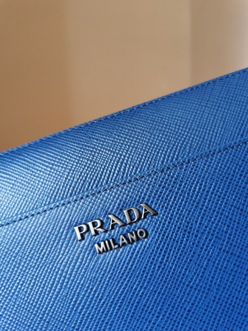 Prad@ Men Logo Word Clutch, Men's Fashion, Bags, Belt bags, Clutches ...