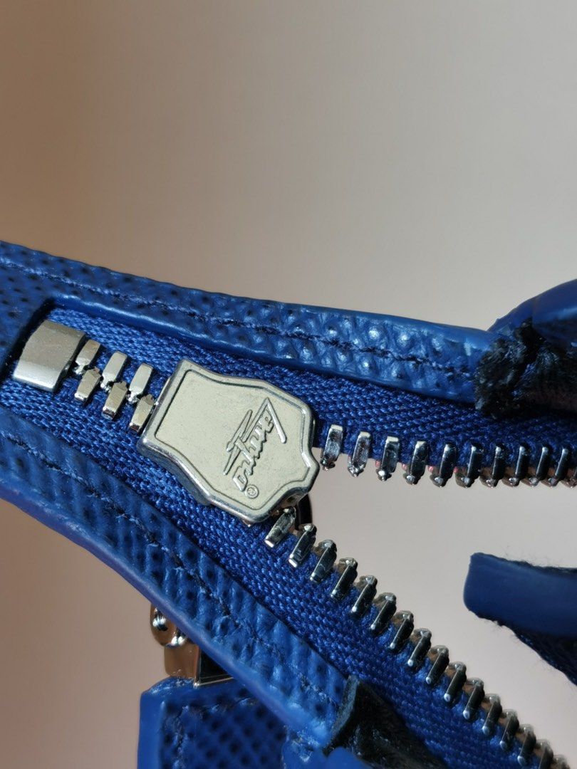 Prad@ Men Logo Word Clutch, Men's Fashion, Bags, Belt bags, Clutches ...