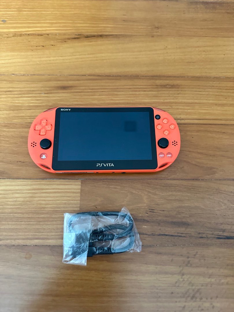 Rare Orange PS Vita Slim $198, Video Gaming, Video Game Consoles, PlayStation on Carousell