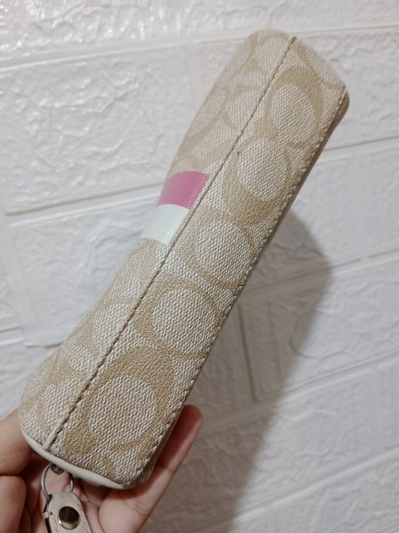Coach pouch, Women's Fashion, Bags & Wallets, Purses & Pouches on Carousell