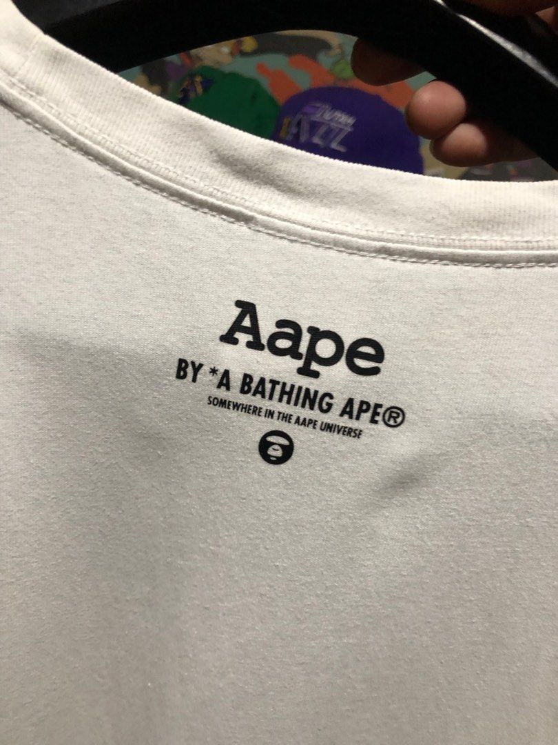 Aape Gold head logo, Men's Fashion, Tops & Sets, Tshirts & Polo Shirts on Carousell