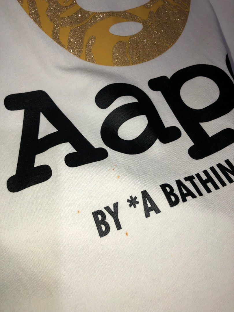 Aape Gold head logo, Men's Fashion, Tops & Sets, Tshirts & Polo Shirts ...