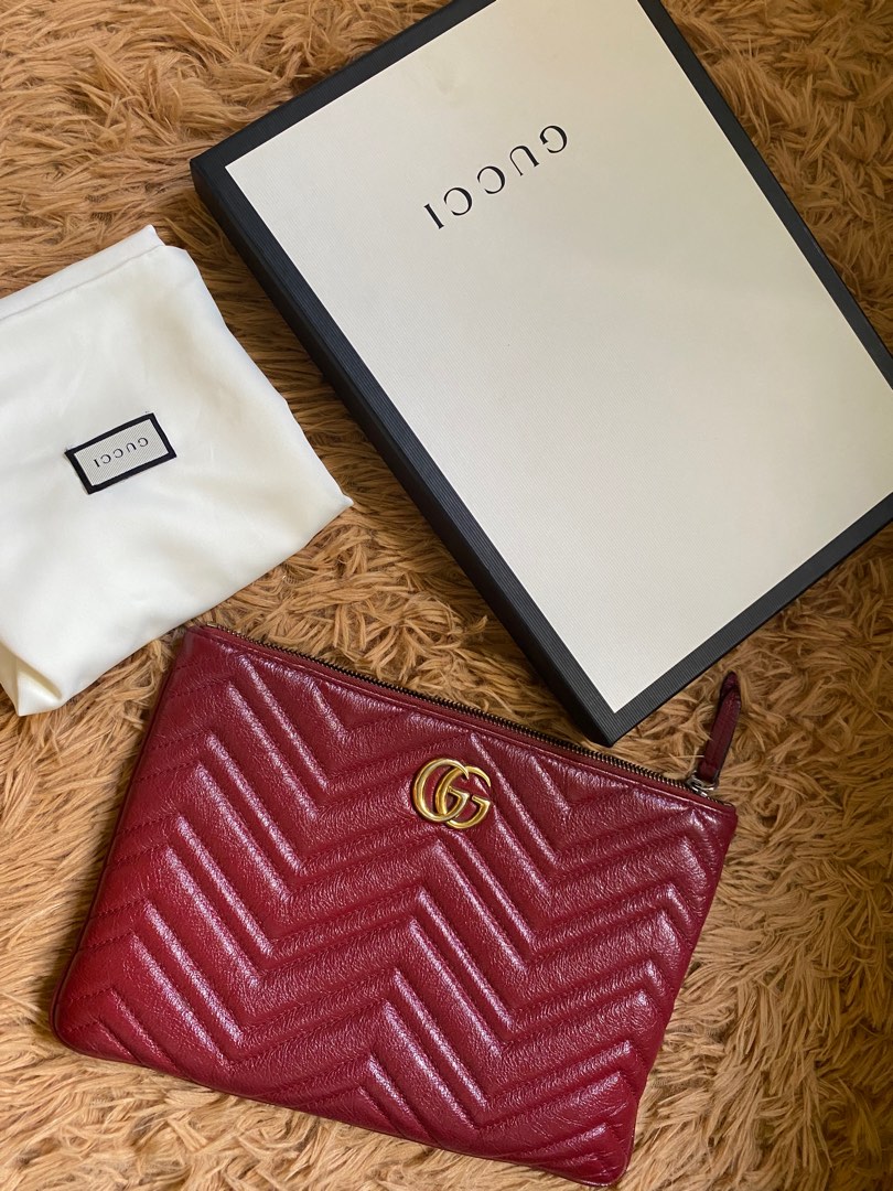 Gucci gg clutch, Luxury, Bags & Wallets on Carousell