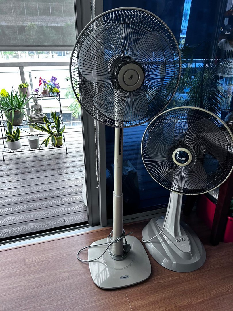 FREE two floor fans preferred to give to low income family / maids ...