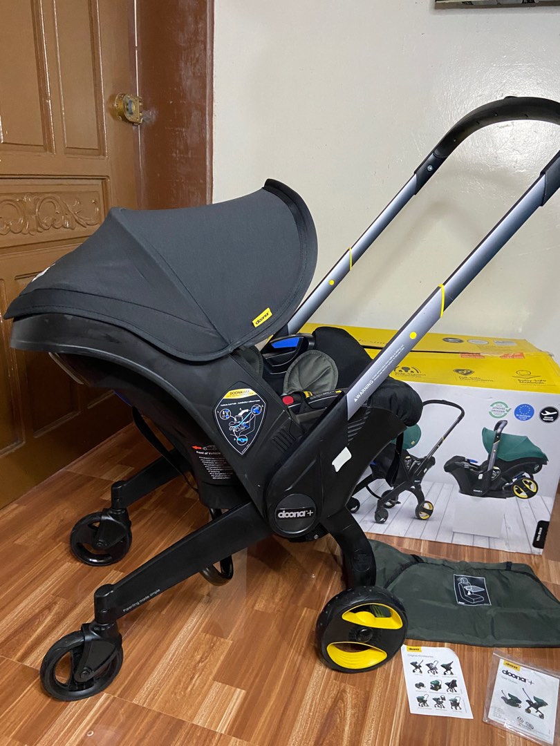 Doona + Stroller Carseat Carrier and Rocker, Babies & Kids, Going Out ...