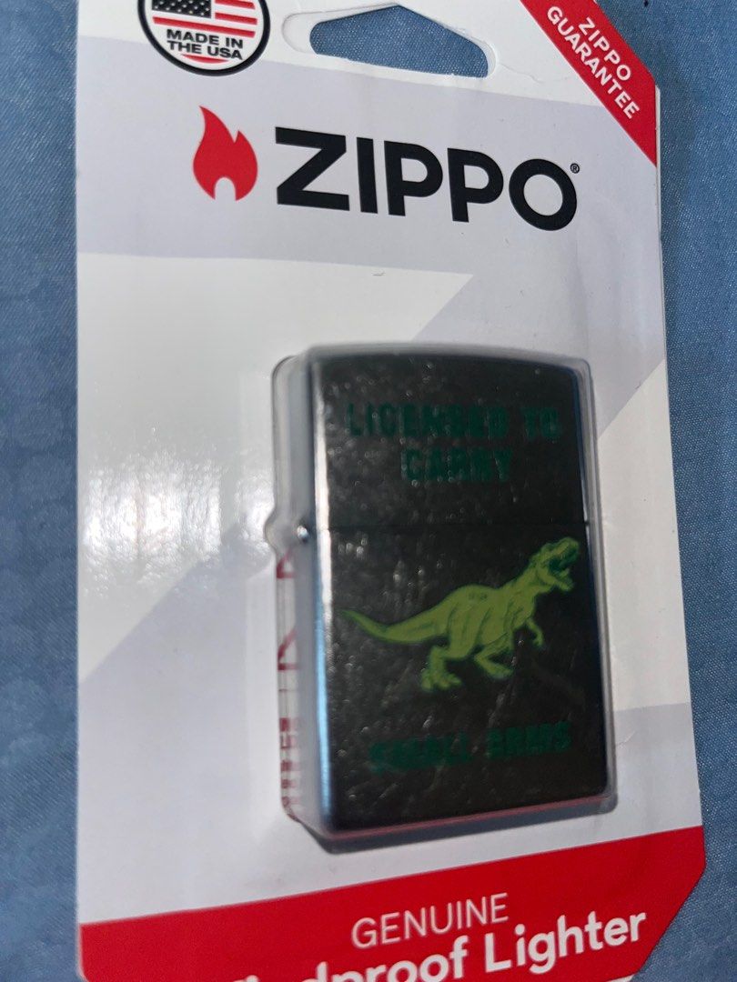 Zippo lighter T-Rex, Everything Else on Carousell