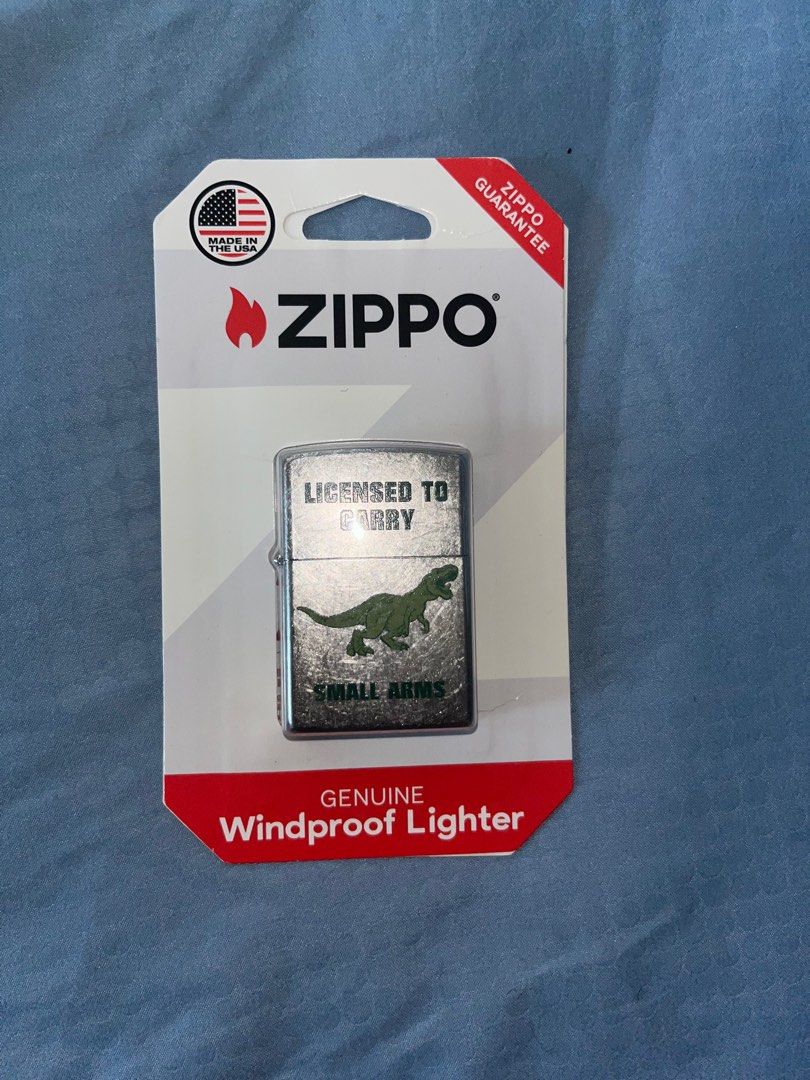 Zippo lighter T-Rex, Everything Else on Carousell