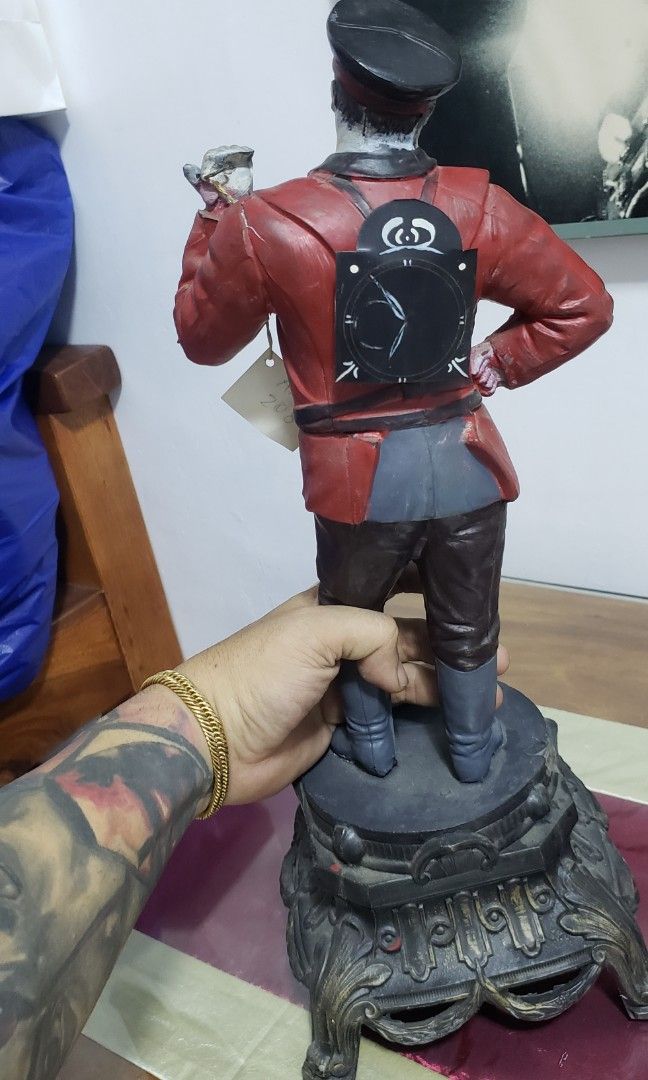 Figure clock cast iron, Hobbies & Toys, Toys & Games on Carousell