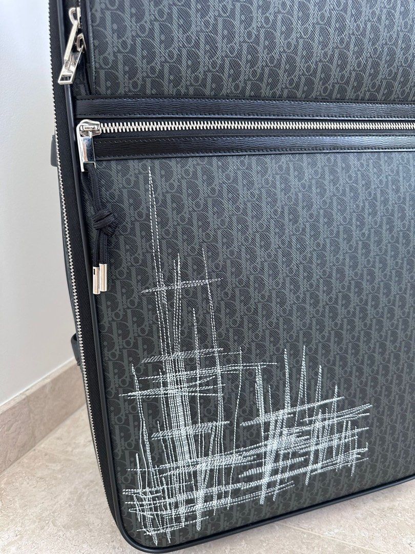 Dior Homme dark light scribble trolley case, Luxury, Bags & Wallets on ...