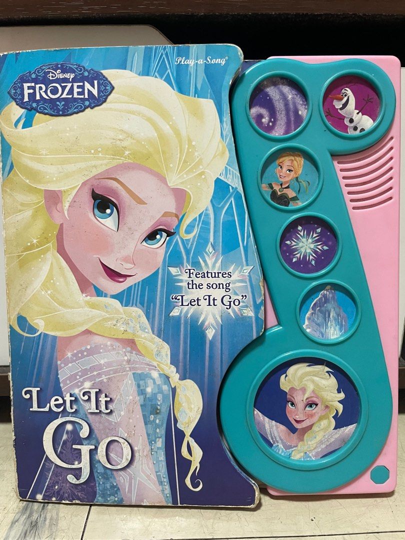 Frozen Let It Go Play a song book, Hobbies & Toys, Books & Magazines ...