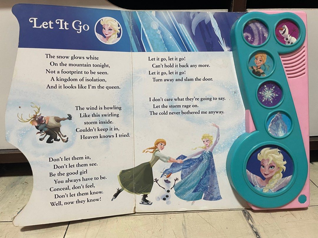 Frozen Let It Go Play a song book, Hobbies & Toys, Books & Magazines ...
