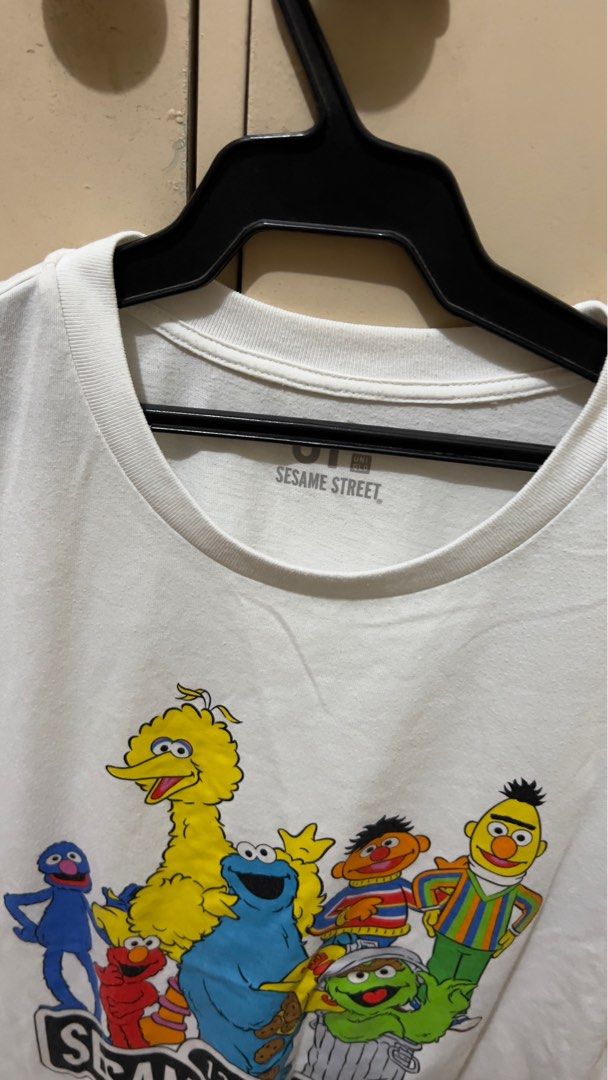 Uniqlo elmo sesame street t shirt white, Women's Fashion, Tops, Shirts ...