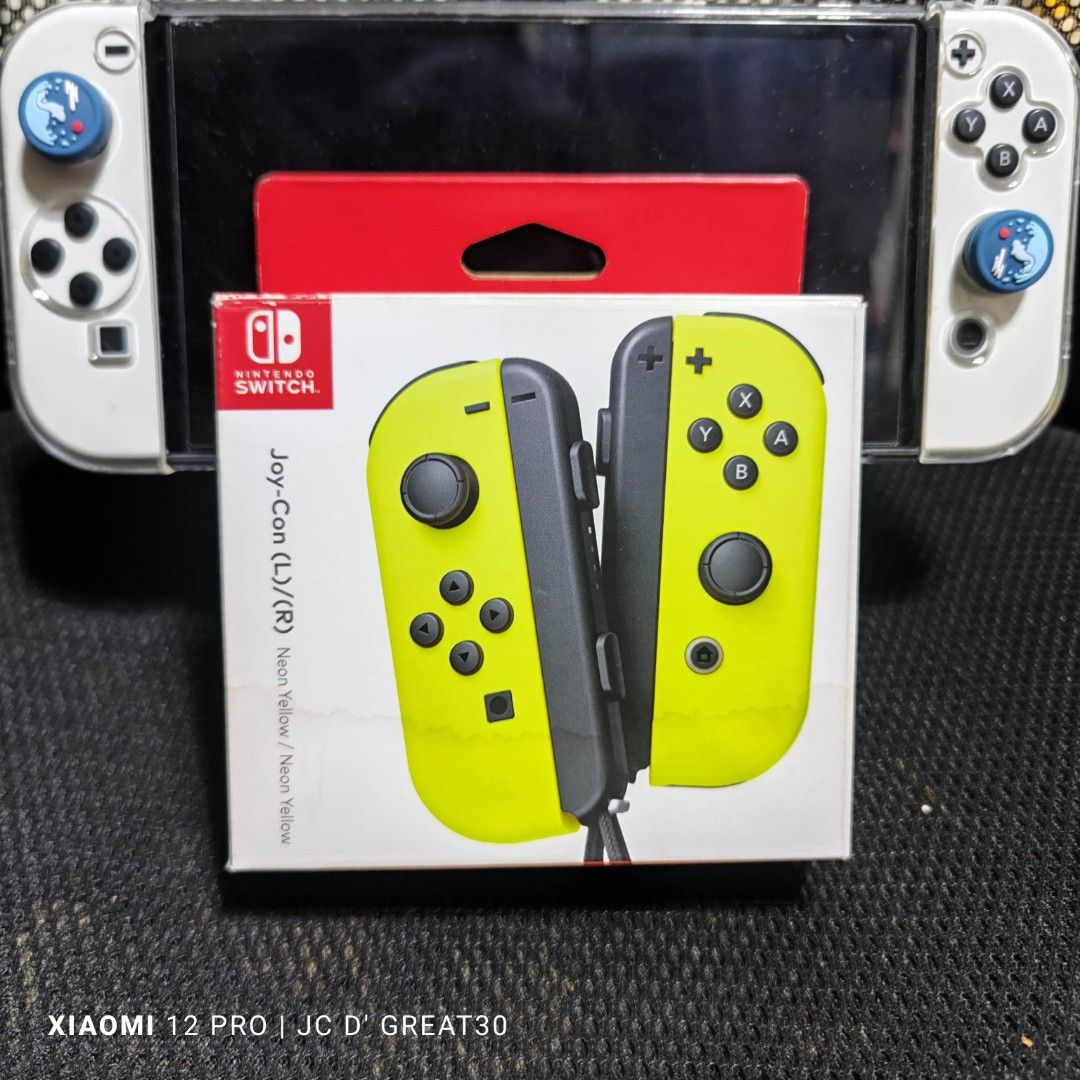 Nintendo Switch joycon neon Yellow Original, Video Gaming, Gaming ...