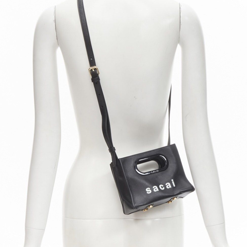 SACAl black leather white logo print crossbody micro shopper tote bag ...