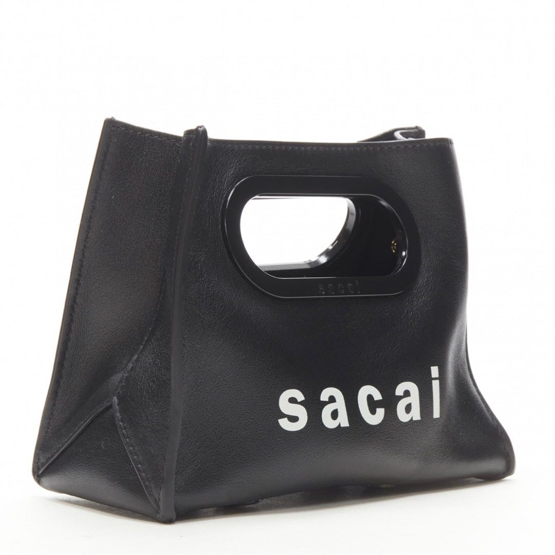 SACAl black leather white logo print crossbody micro shopper tote bag ...
