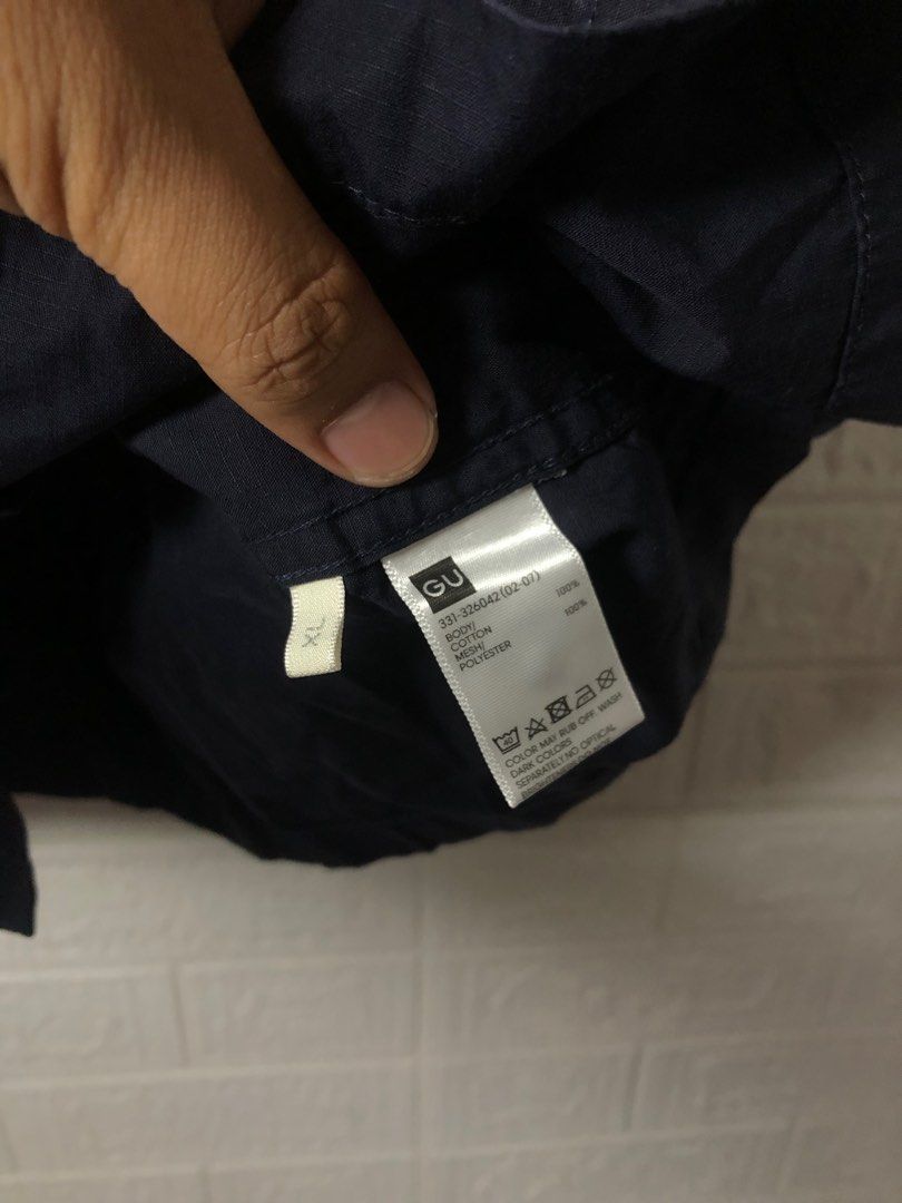 GU Utility Polo, Men's Fashion, Activewear on Carousell