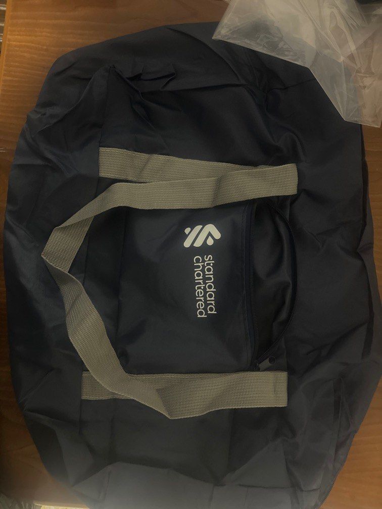 Standard Chartered Travel bag, Men's Fashion, Bags, Backpacks on Carousell