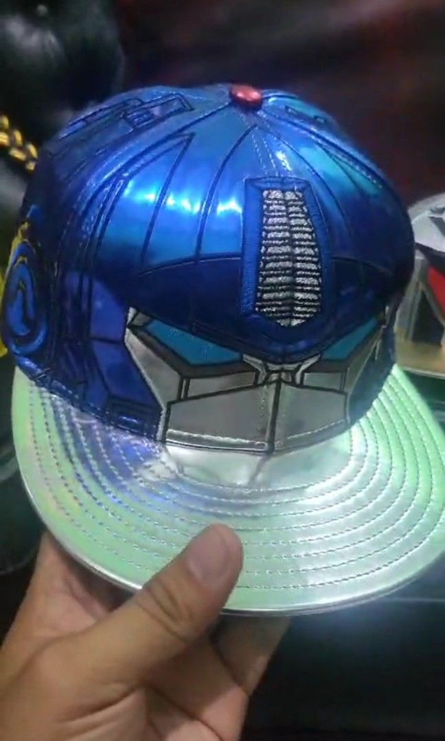 Topi new era x Transformers rare item, Fesyen Pria, Aksesoris, Topi di ...