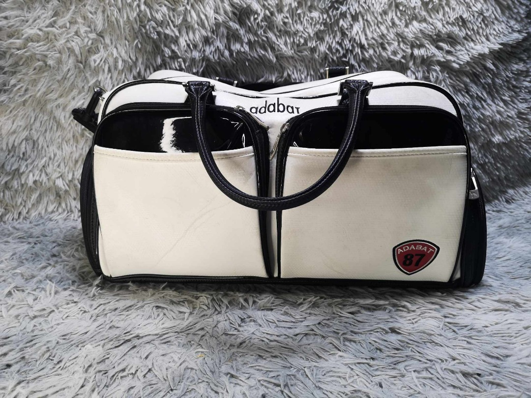Adabat White Black Leather Duffle Bag, Women's Fashion, Bags & Wallets, Beach Bags on Carousell
