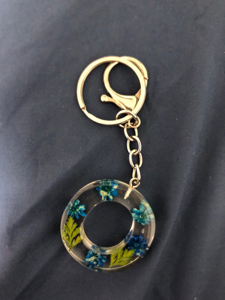 Dried blue flower alphabet O keychain, Everything Else on Carousell