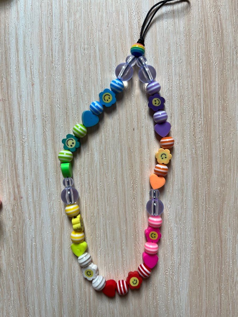 Mobile phone accessories: pop socket finger support, smiley face and ...