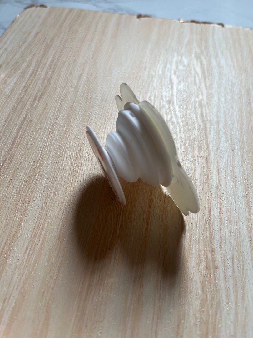 Mobile phone accessories: pop socket finger support, smiley face and ...