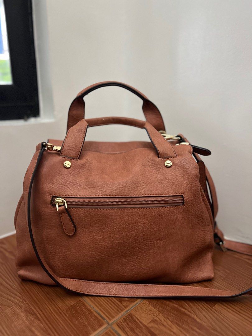 Duani Sling, Women's Fashion, Bags & Wallets, Cross-body Bags on Carousell