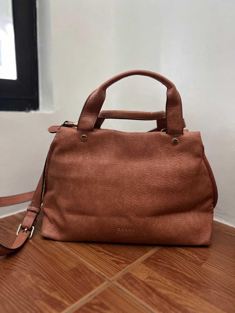 Duani Sling, Women's Fashion, Bags & Wallets, Cross-body Bags on Carousell