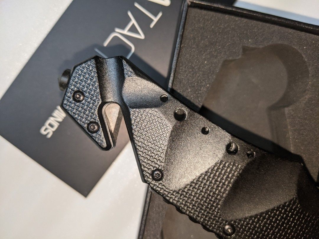 100% new in gift box evatac rescue knife shadow matte black color, seat belt cutter, liner lock ...